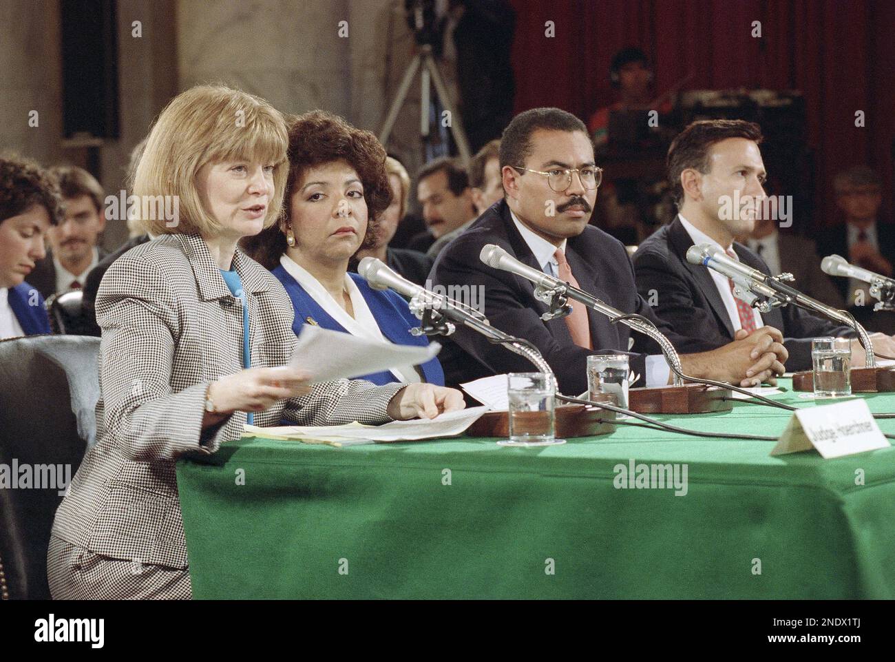 Judge Susan Hoerchner, left, reads her opening statement to the Senate ...