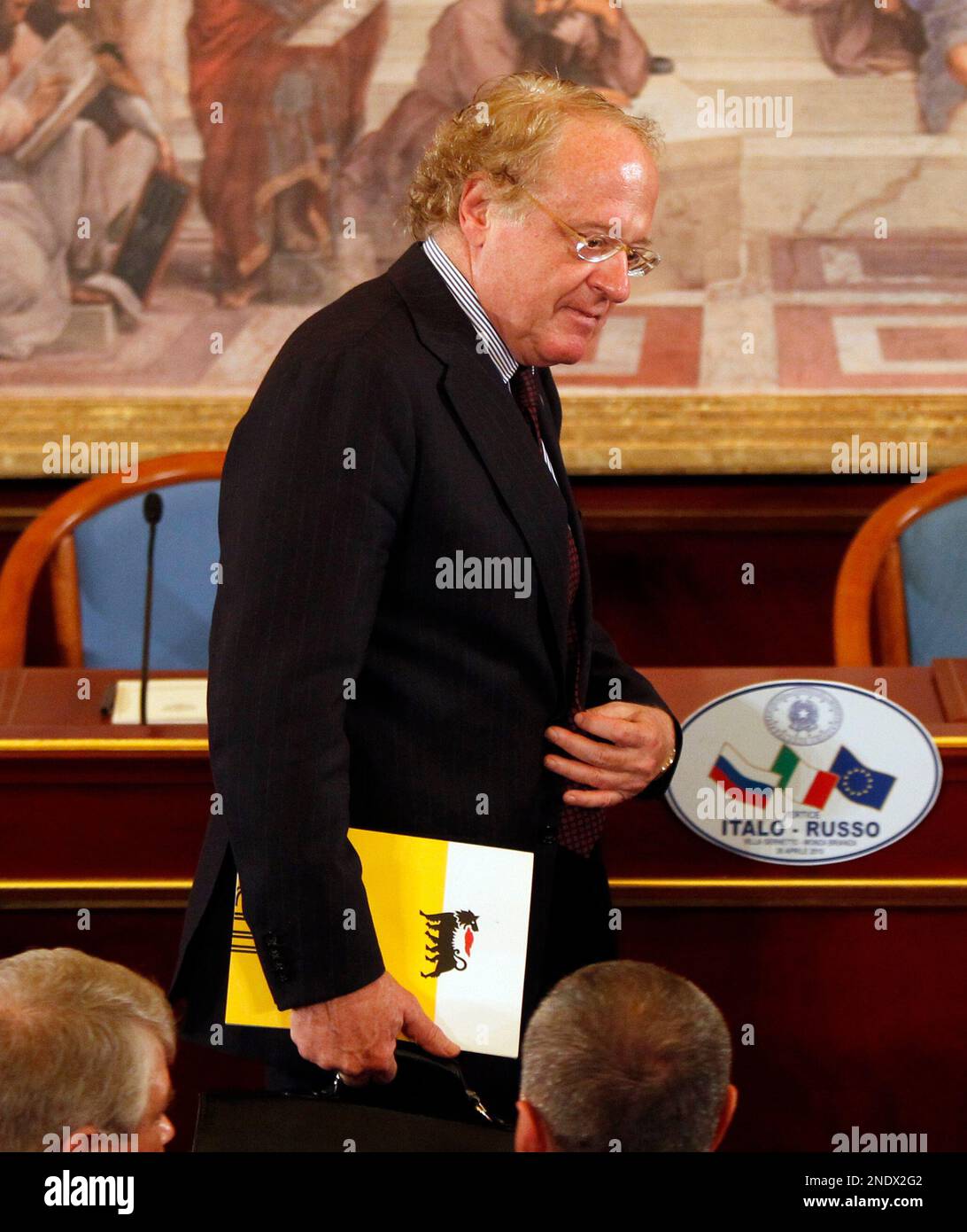 Eni CEO Paolo Scaroni arrives for a press conference at Villa Gernetto ...