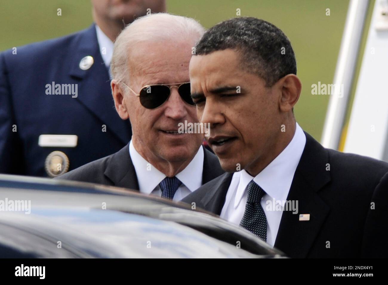 President Barack Obama, right, is greeted by Vice President Joe Biden ...