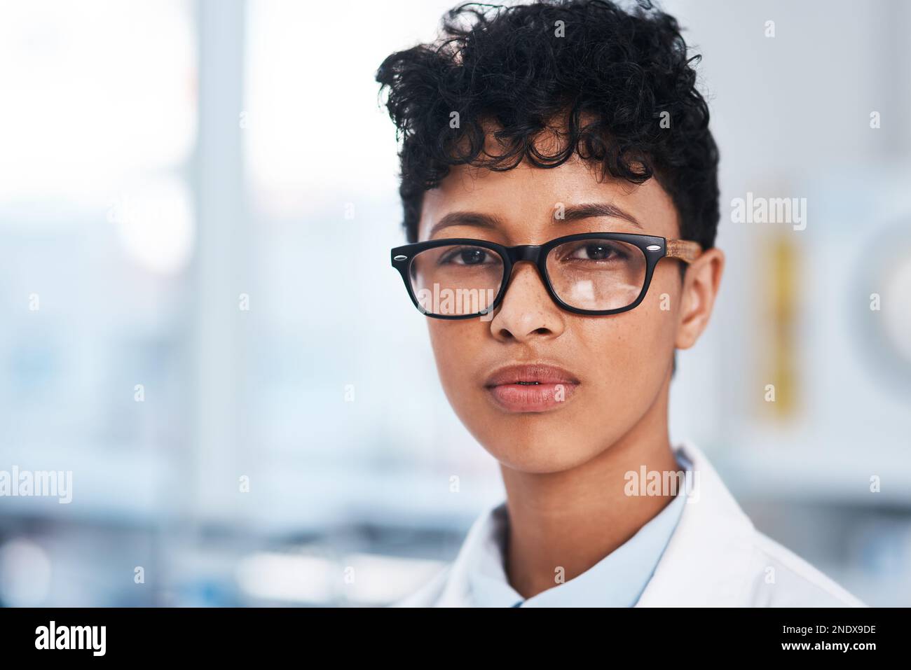 Science is a discipline for the curious like me. Portrait of a young ...