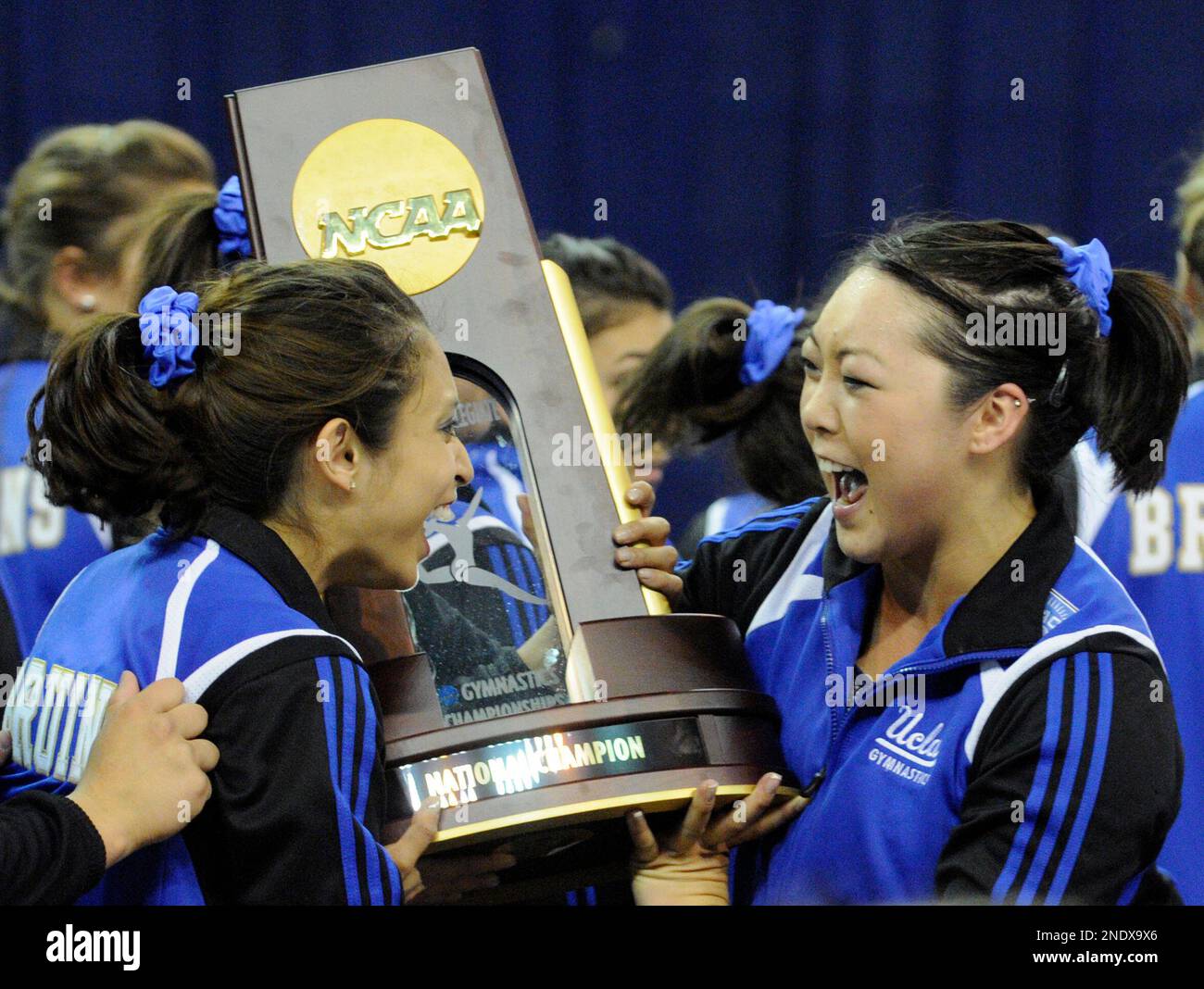 UCLA gymnasts Vanessa Zamarripa, left, and Anna Li celebrate team ...