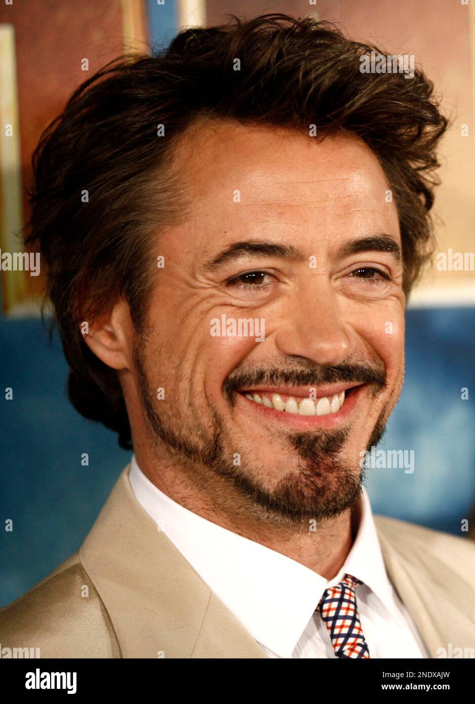 Actor Robert Downey Jr. poses for photographers during a photo call for ...