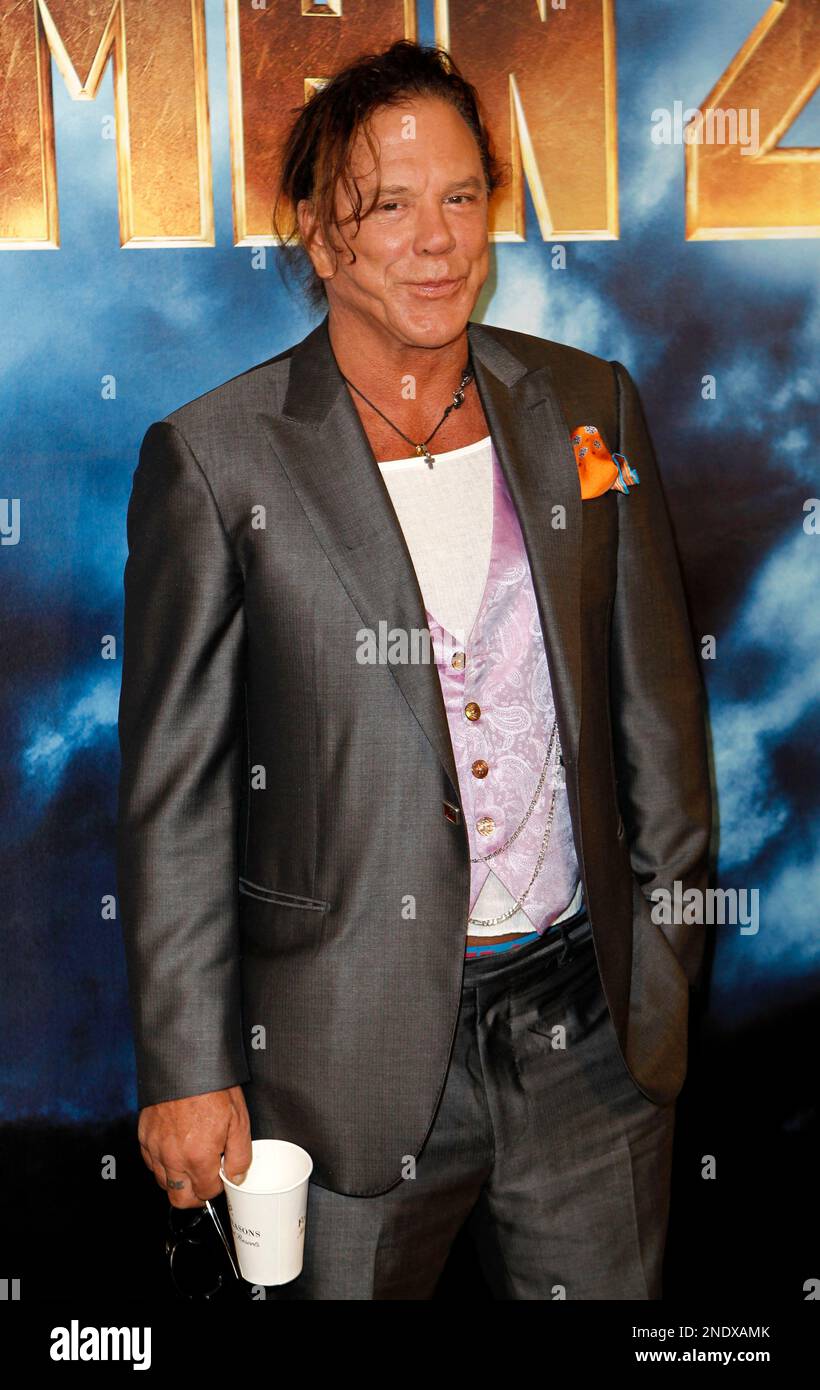 Actor Mickey Rourke poses for photographers during a photo call for the ...