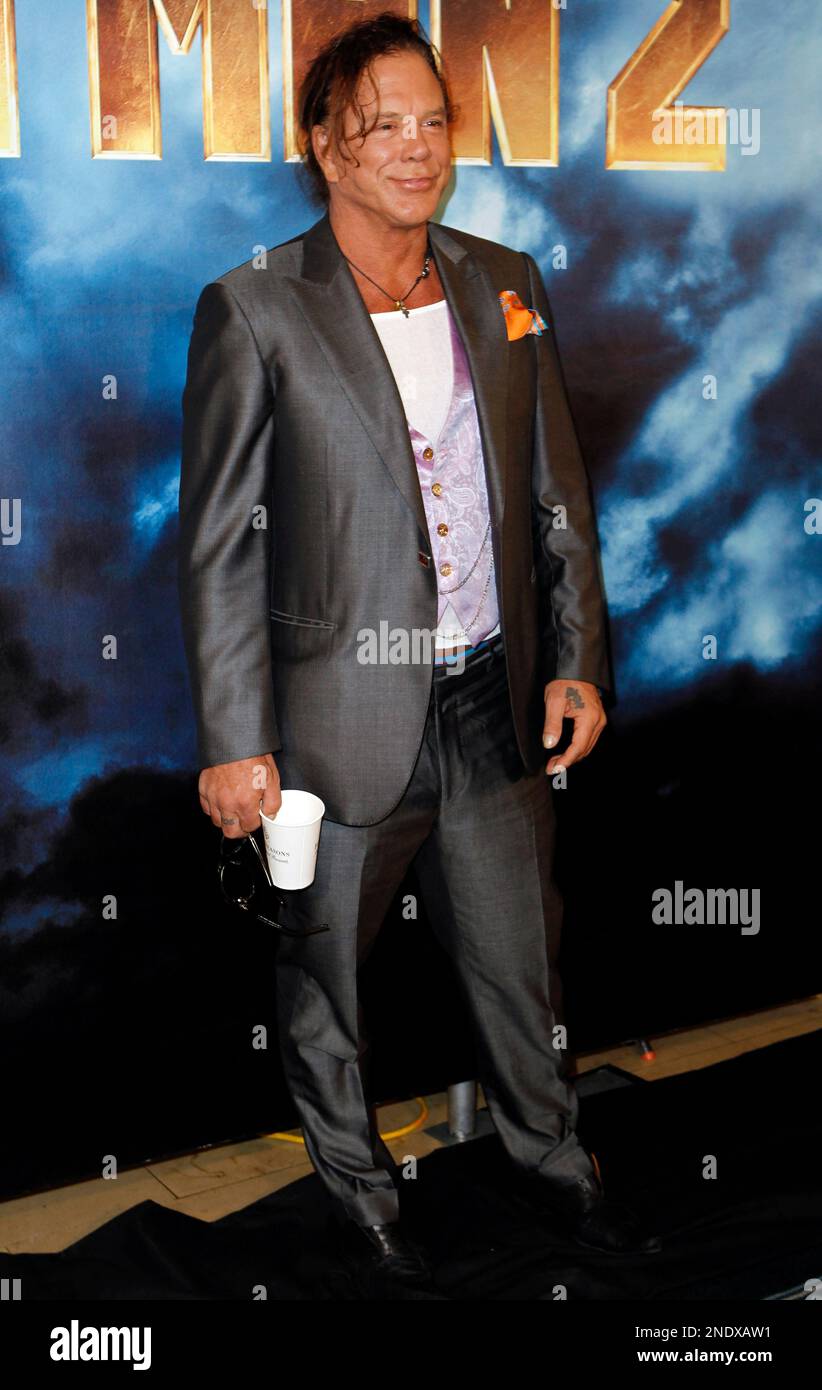 Actor Mickey Rourke poses for photographers during a photo call for the ...