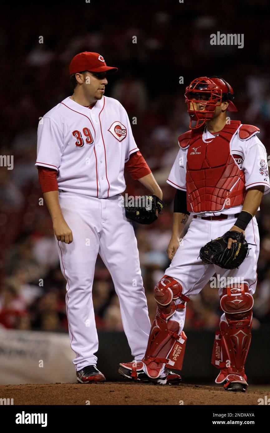 Cincinnati Reds starting pitcher Aaron Harang talks with catcher Ramon ...