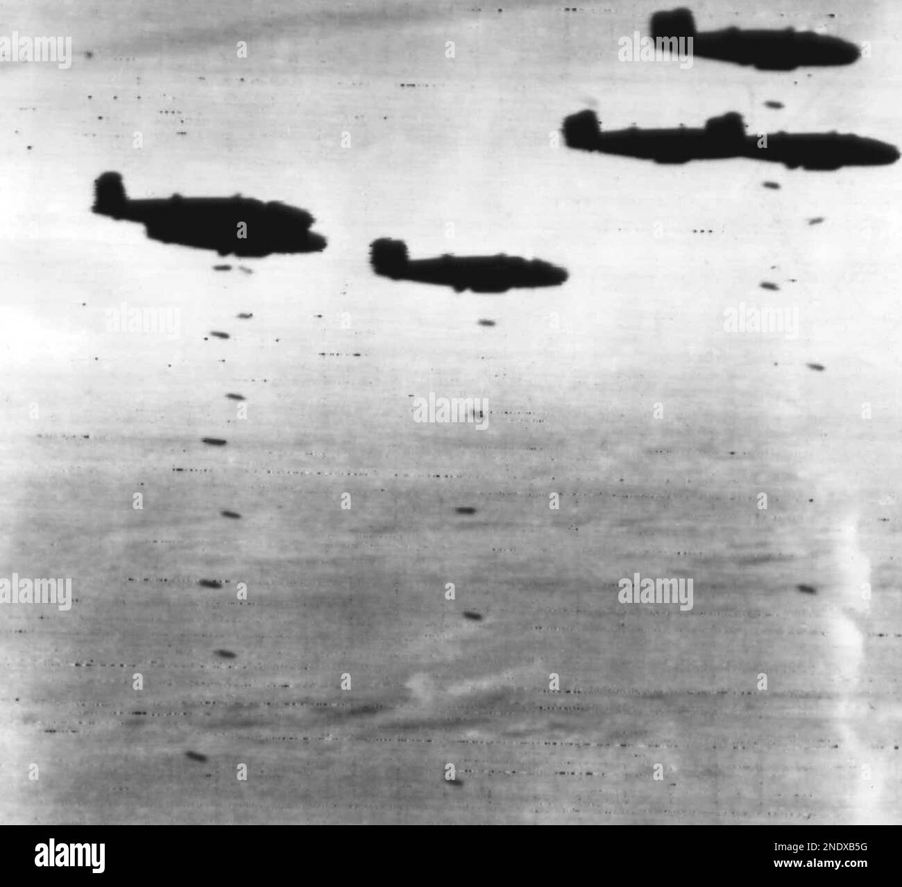 More than a score of bombs from a formation of U.S.-Built “Mitchell” (B ...