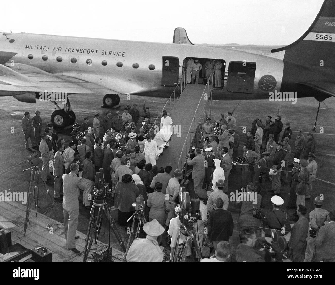The first former prisoner of war was brought down the ramp of plane ...