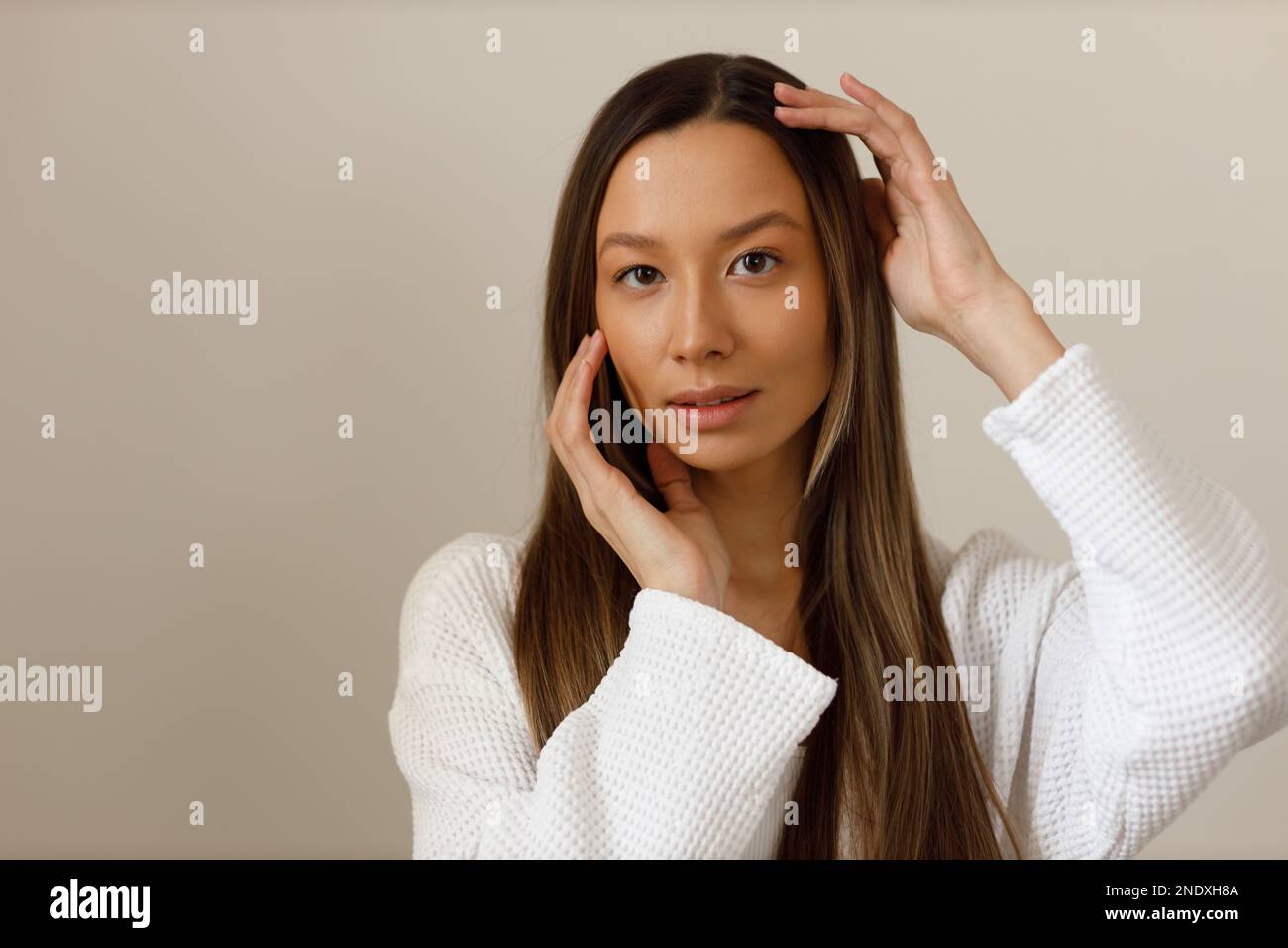 Young asian woman doing face building yoga and facial gymnastics self ...