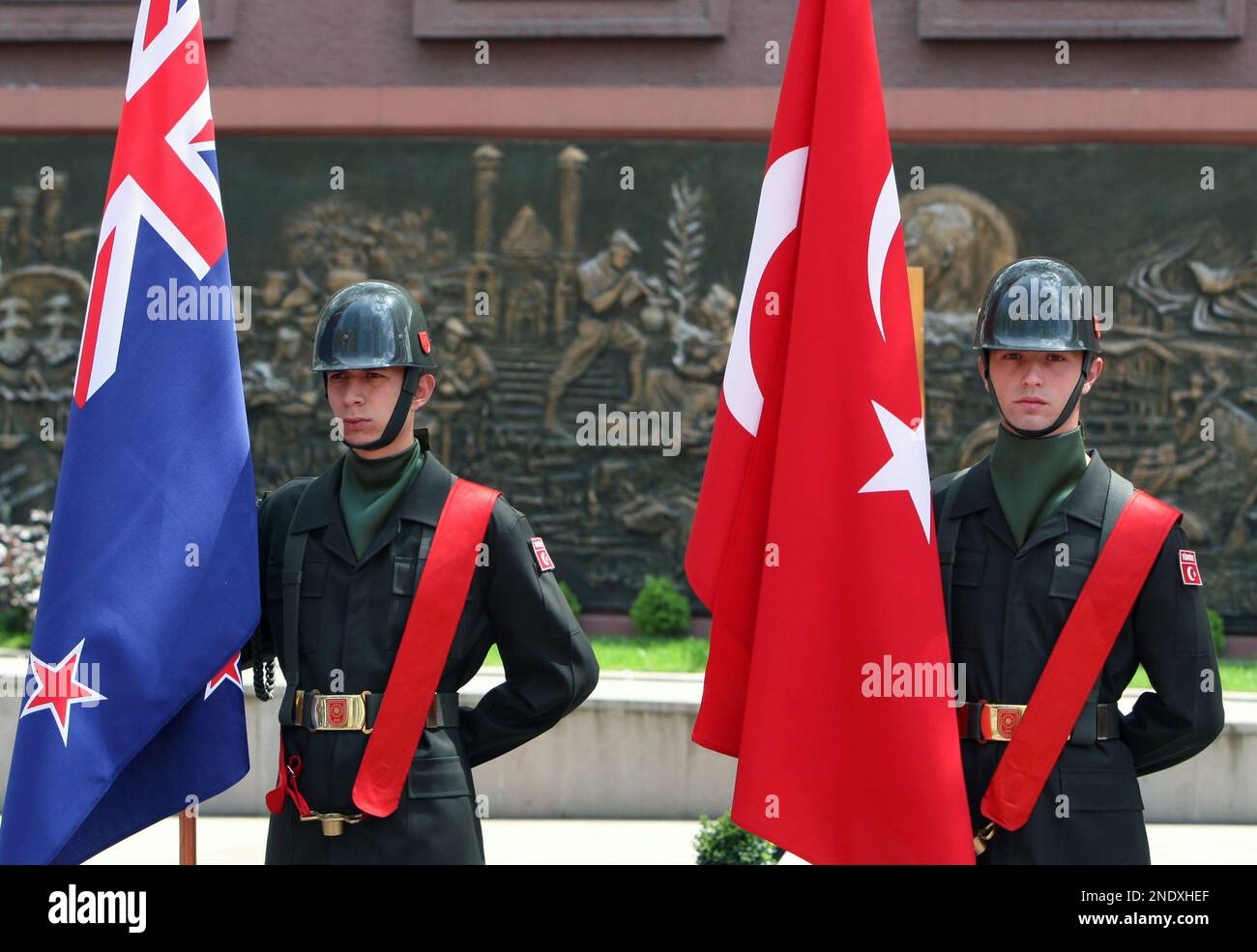 Turkish guard of honour soldiers hold a Turkish, right, and a New ...
