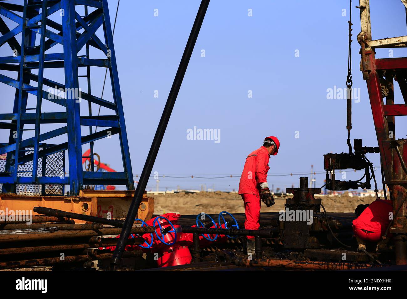 the oil workers are working Stock Photo - Alamy