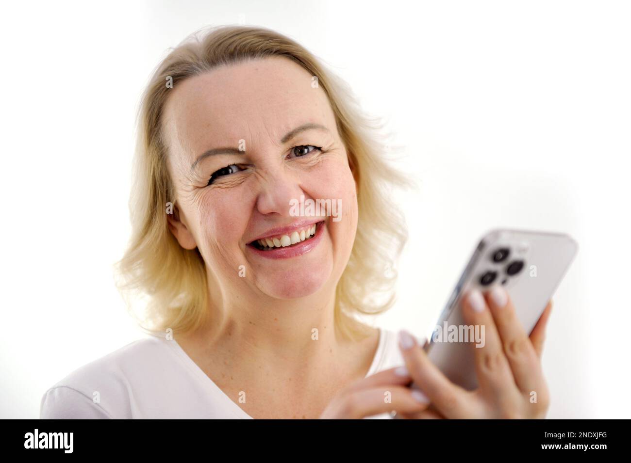 Blonde female with a nice appearance looks terrible expression in a ...