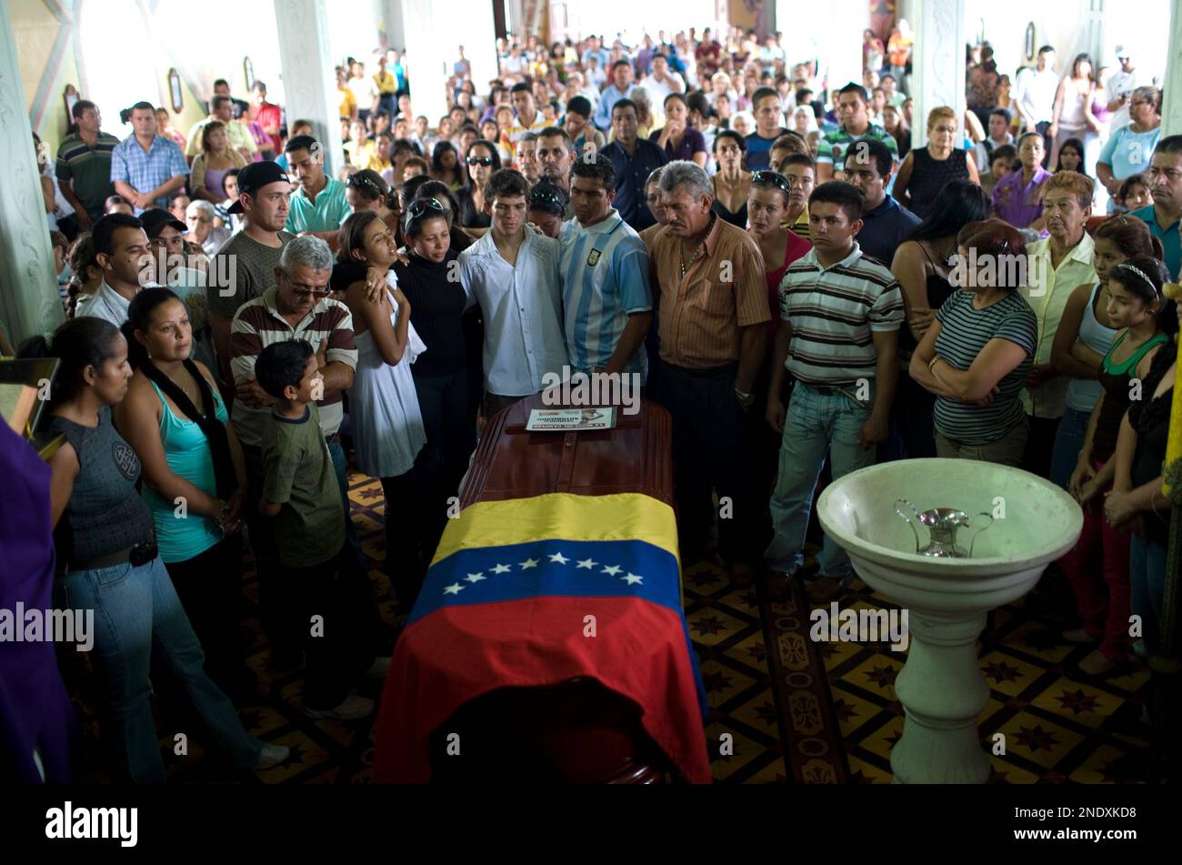 Fans and relatives attend the funeral of former world boxing champion ...