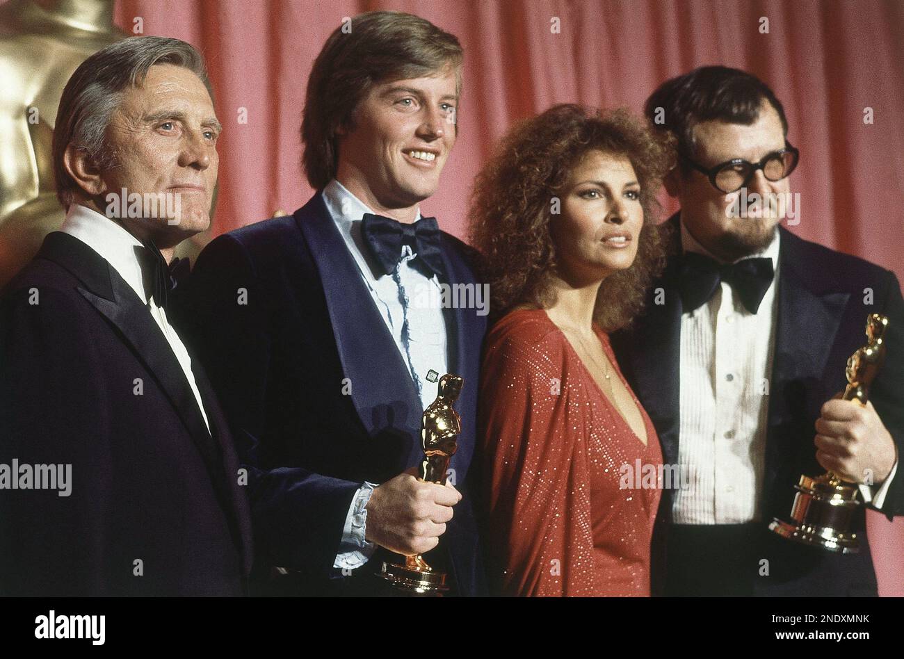 Actors Raquel Welch, left, and Kirk Douglas, second from right, stand ...