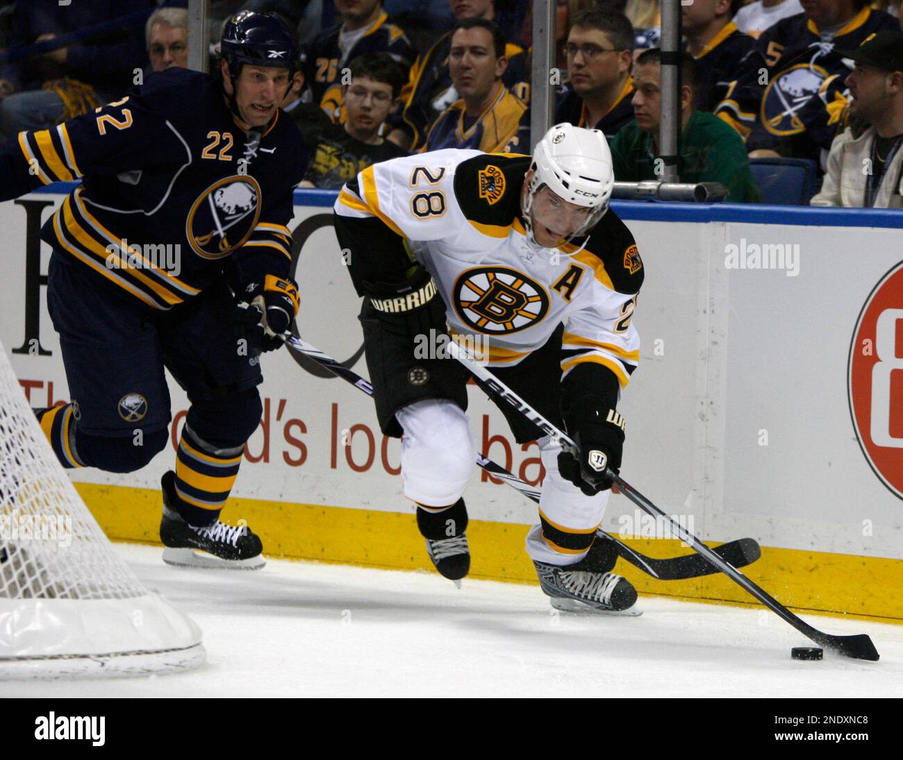 Buffalo Sabres' Adam Mair (22) against Boston Bruins' Mark Recchi ...