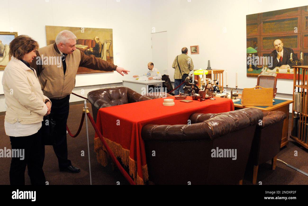 Visitor look at the working table that belonged to Vladimir Lenin, who ...