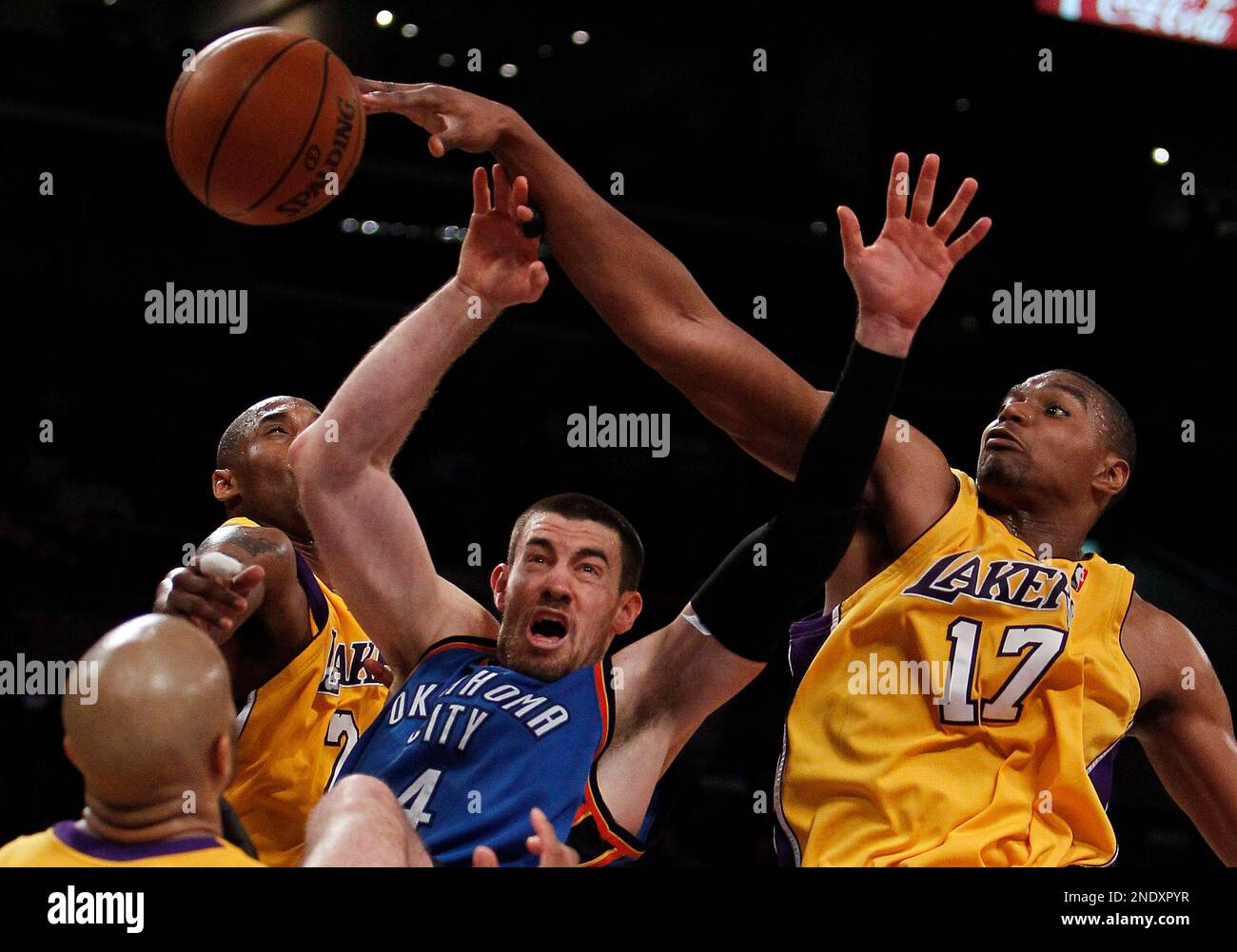 Oklahoma City Thunder forward Nick Collison (4) fights for a rebound ...