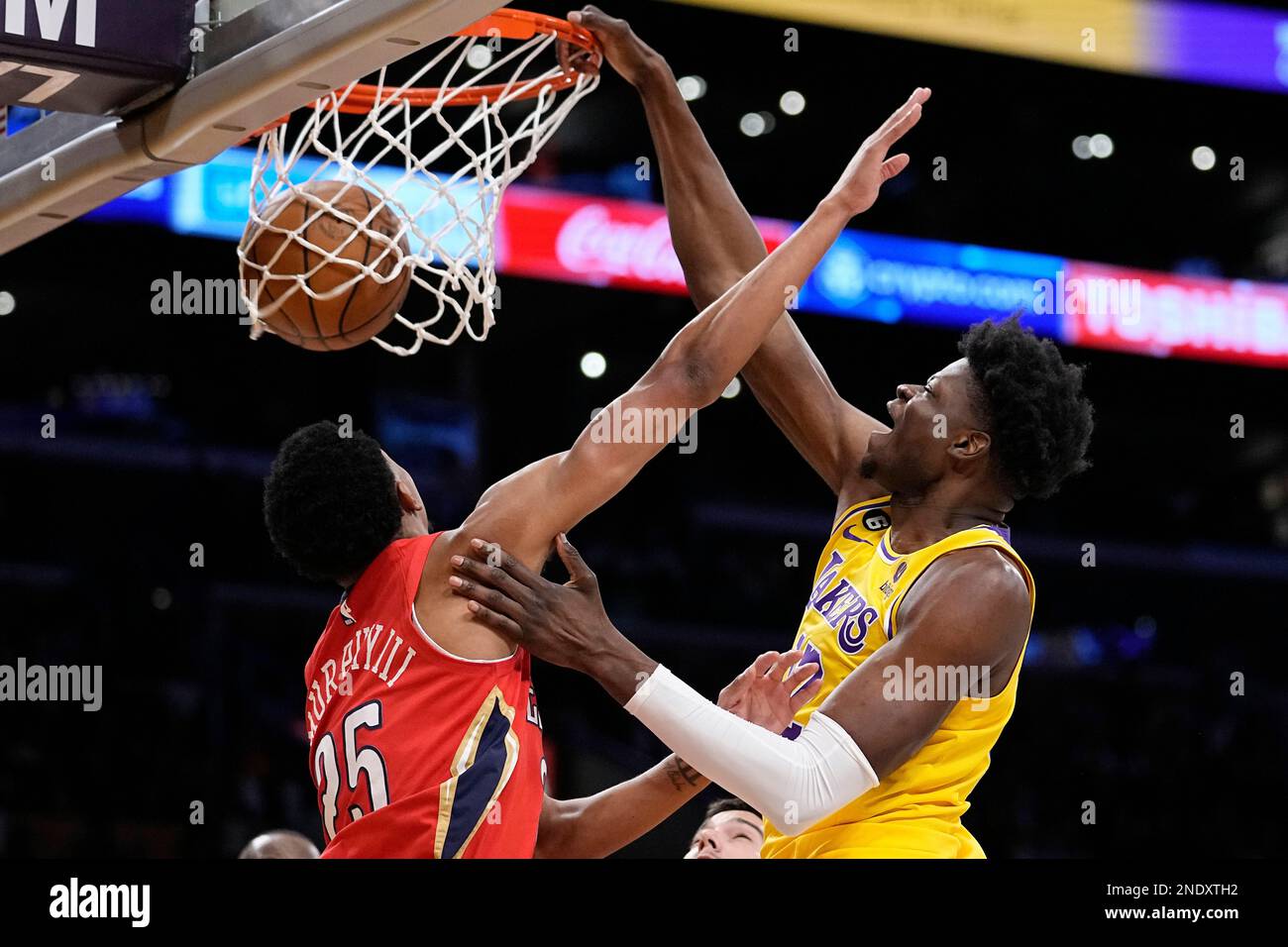 Los Angeles Lakers center Mo Bamba, right, dunks as New Orleans ...