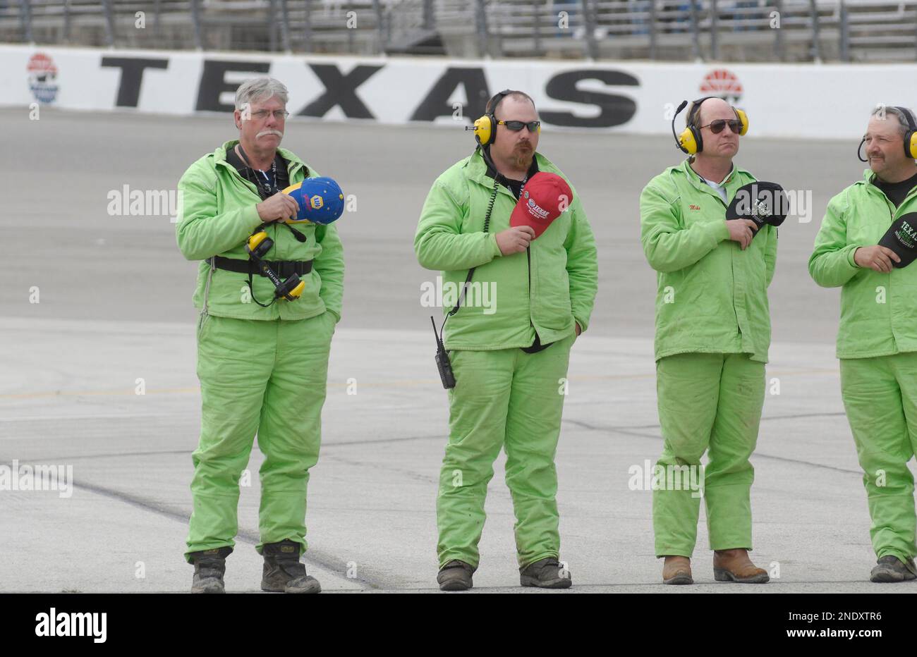 Safety Crew members during the national anthem before the NASCAR Sprint ...