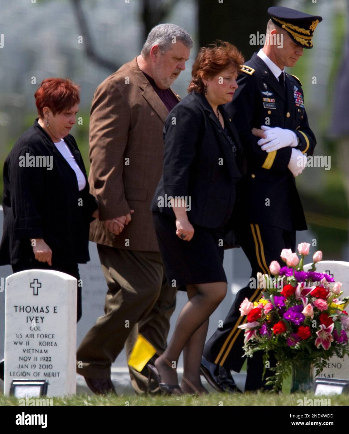 Lt. Gen. Francis Kearney, right, escorts the family of Army Cpl ...