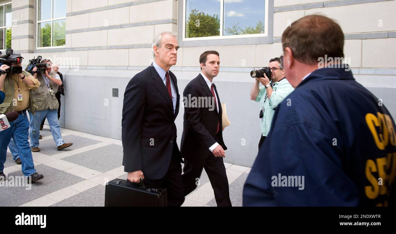 Attorney Joseph A. Hayden Jr., center left, and his client, former ...