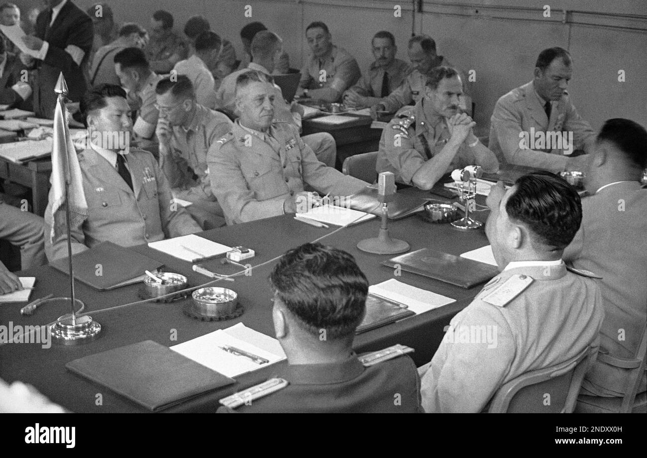 United Nations and North Korea representatives face each other across ...