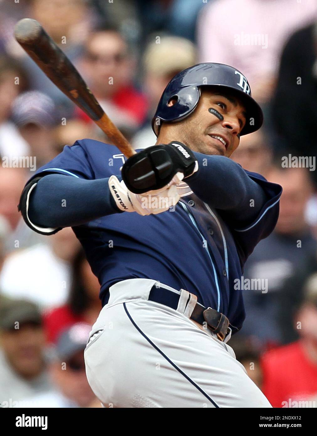 Tampa Bay Rays' Carlos Pena follows through on a hit during a MLB ...