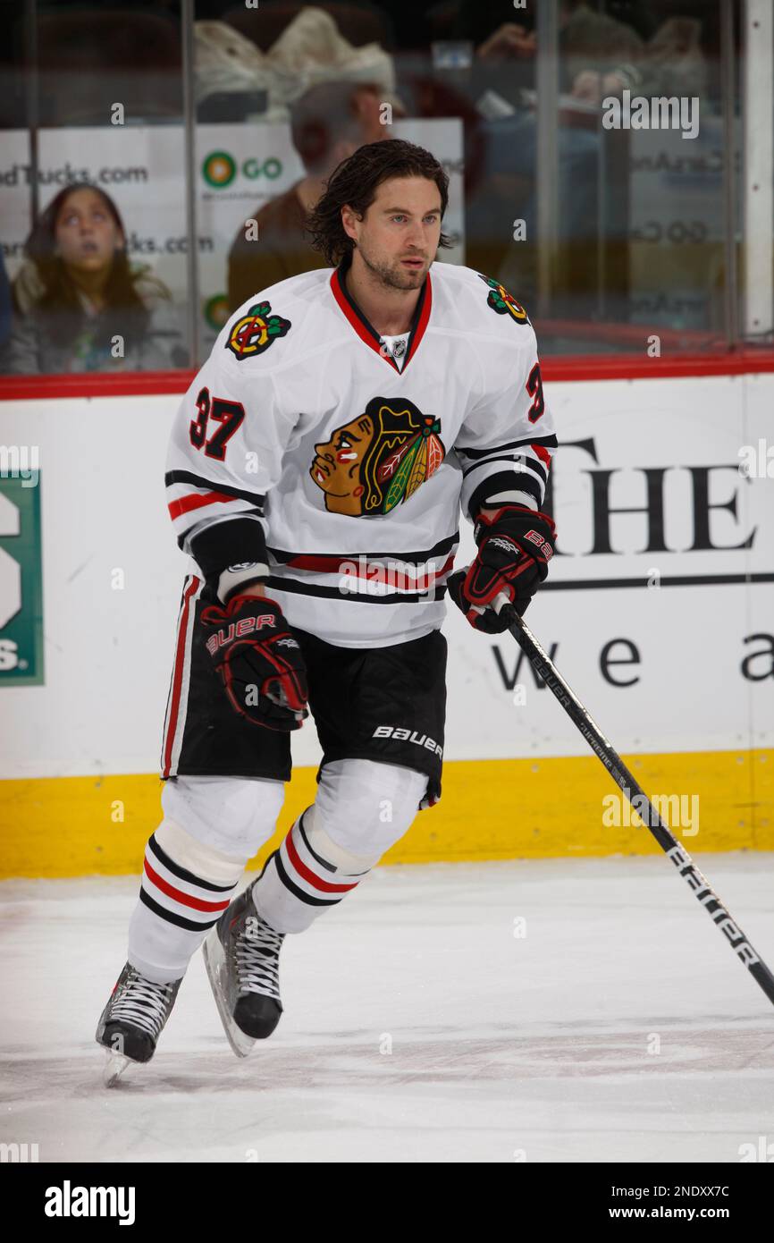 Chicago Blackhawks right winger Adam Burish warms up before facing the ...