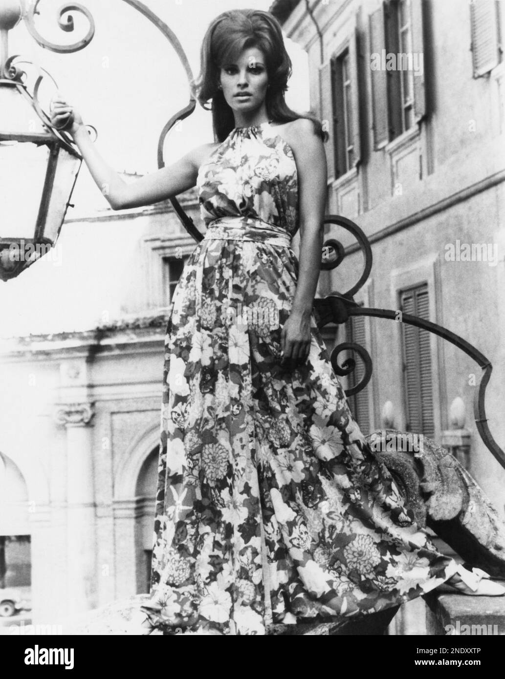 Hollywood actress Raquel Welch wears a flower patterned evening dress ...