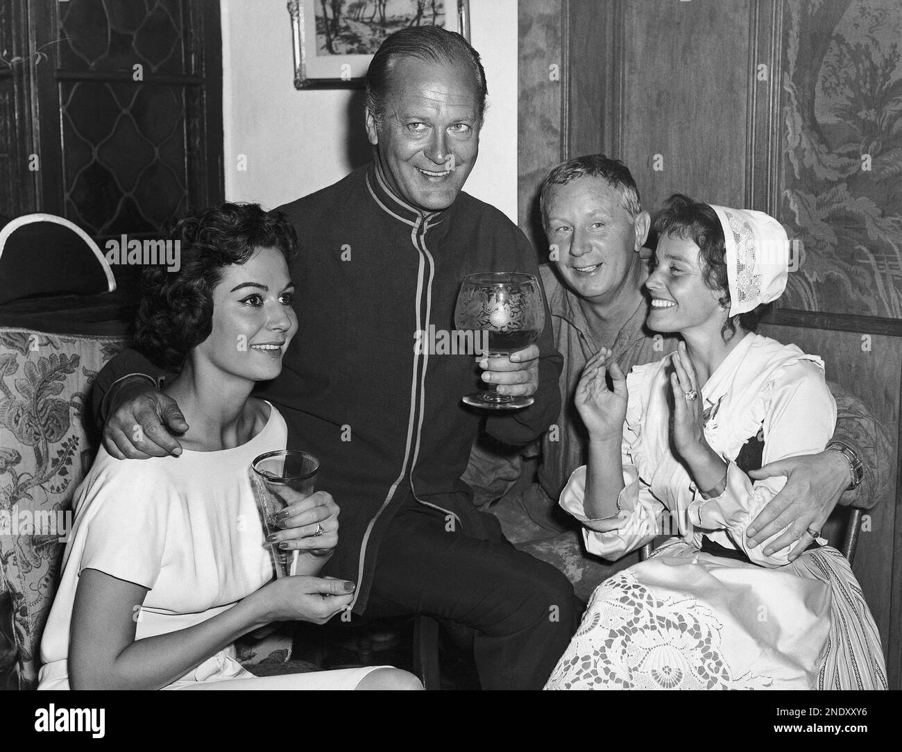 Curd Juergens, 42-year-old German actor, second from left, is shown ...
