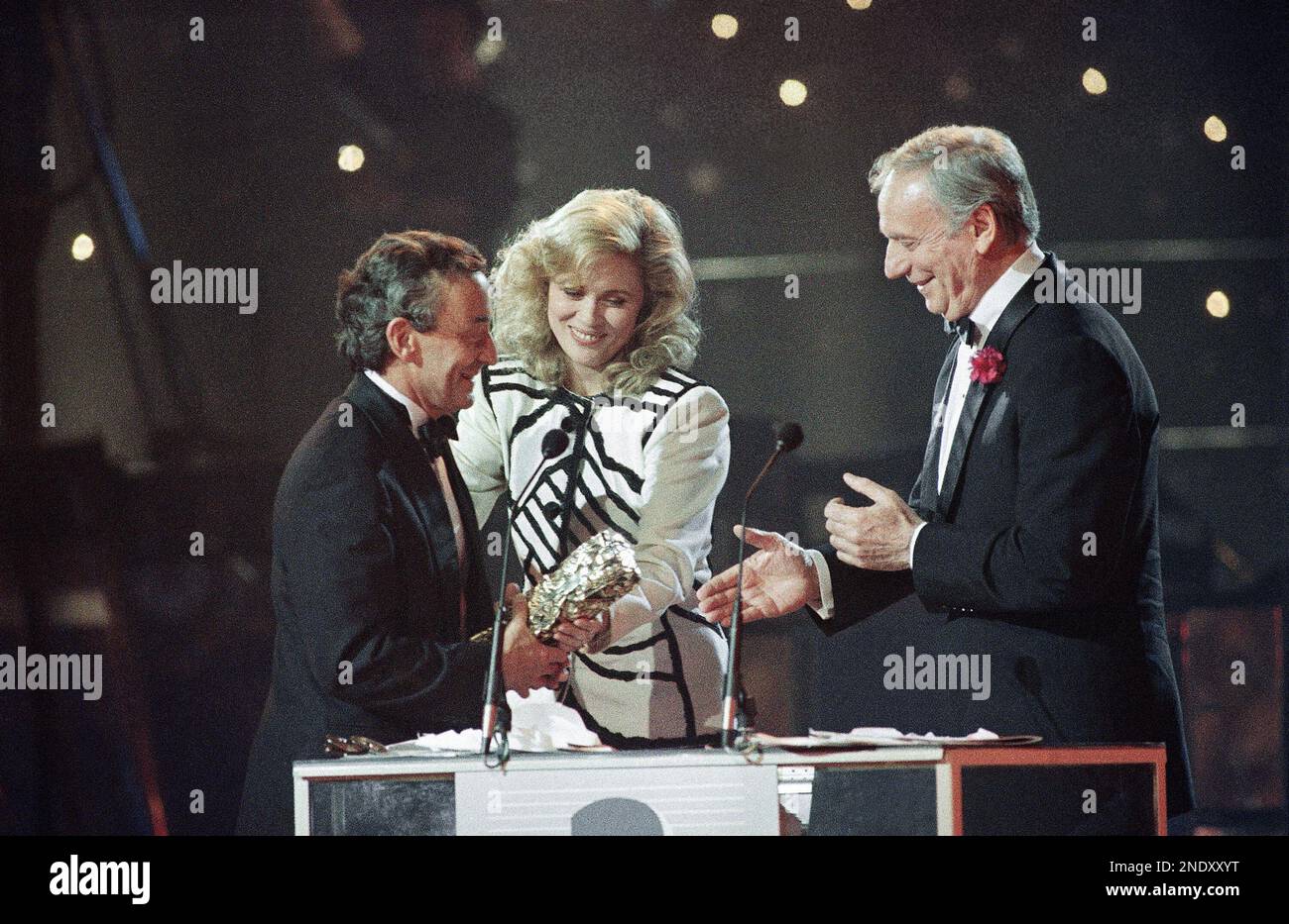 French movie director Louis Malle, left, is congratulated by U.S ...