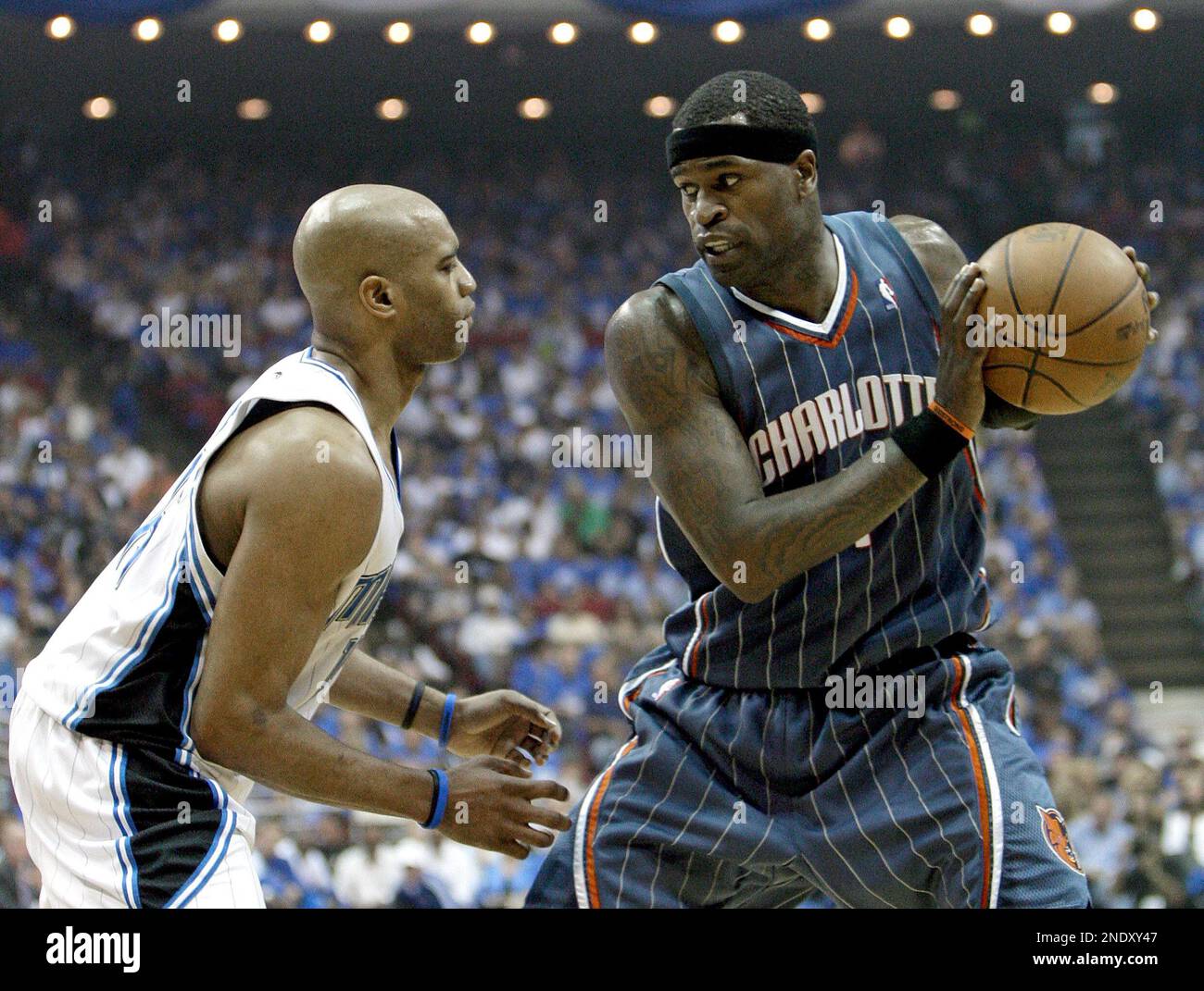 Charlotte Bobcats guard Stephen Jackson, right, tries to get around ...
