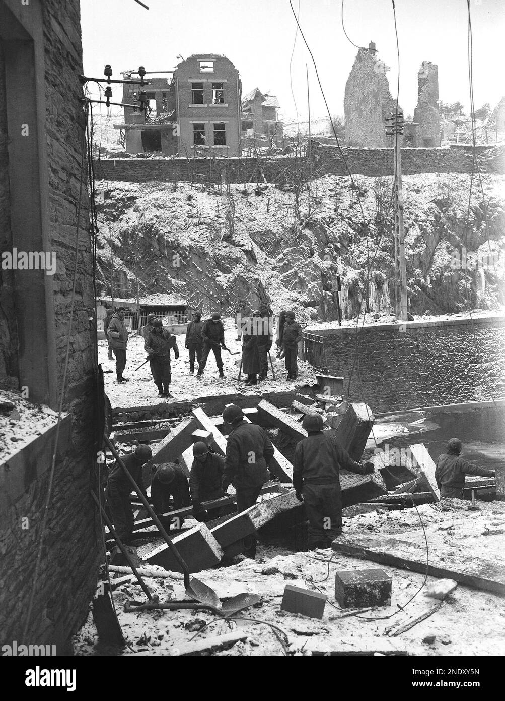 First army engineers construct a bridge over the Ourthe River, at ...