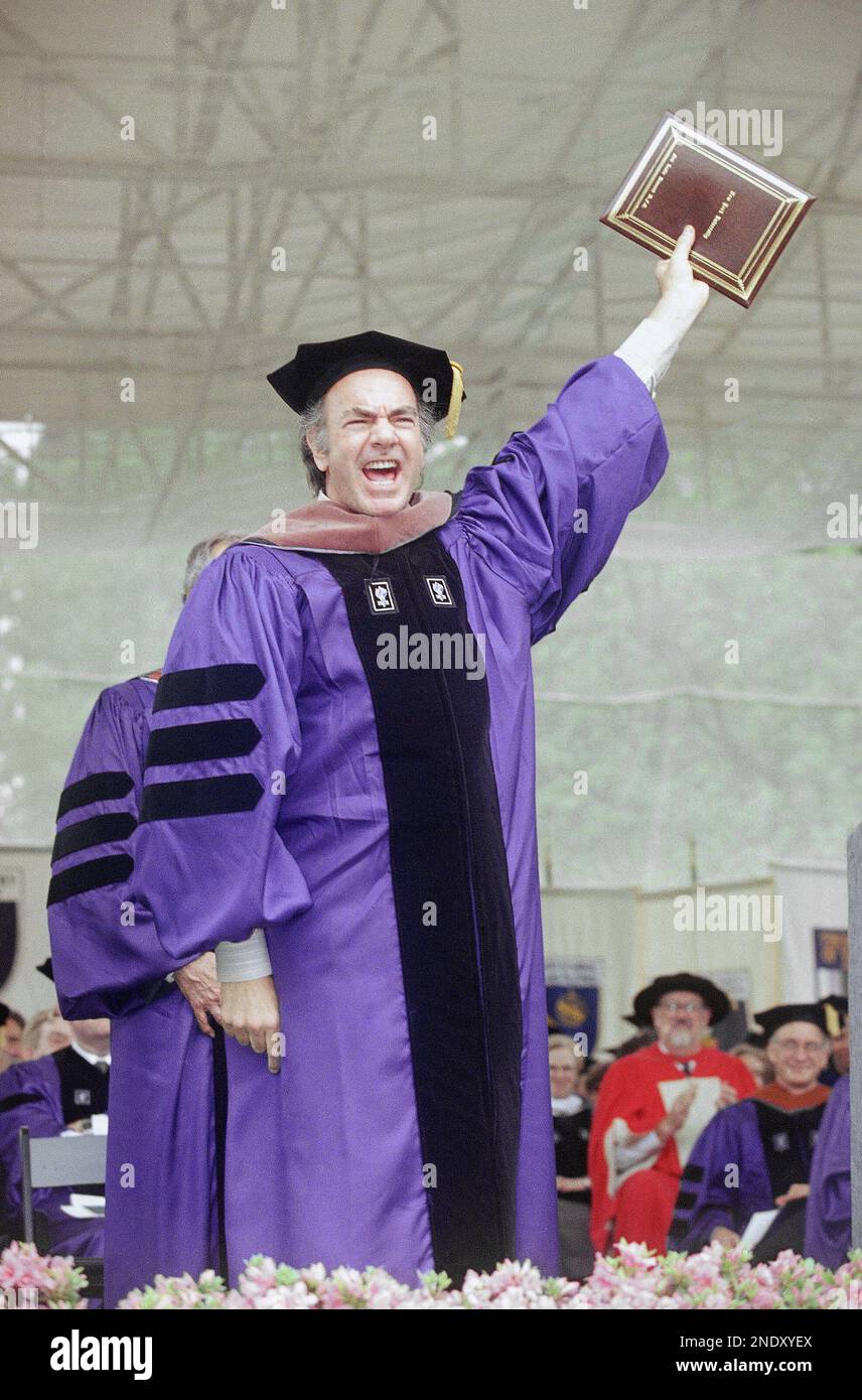 Entertainer Neil Diamond yells to the crowd after being awarded an ...