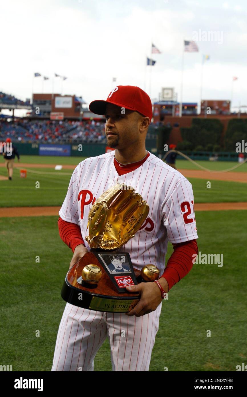 Philadelphia Phillies' Placido Polanco shows off his 2009 gold glove ...