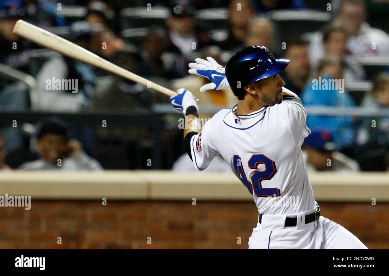 New York Mets' Angel Pagan follows through on a seventh-inning, two-run ...