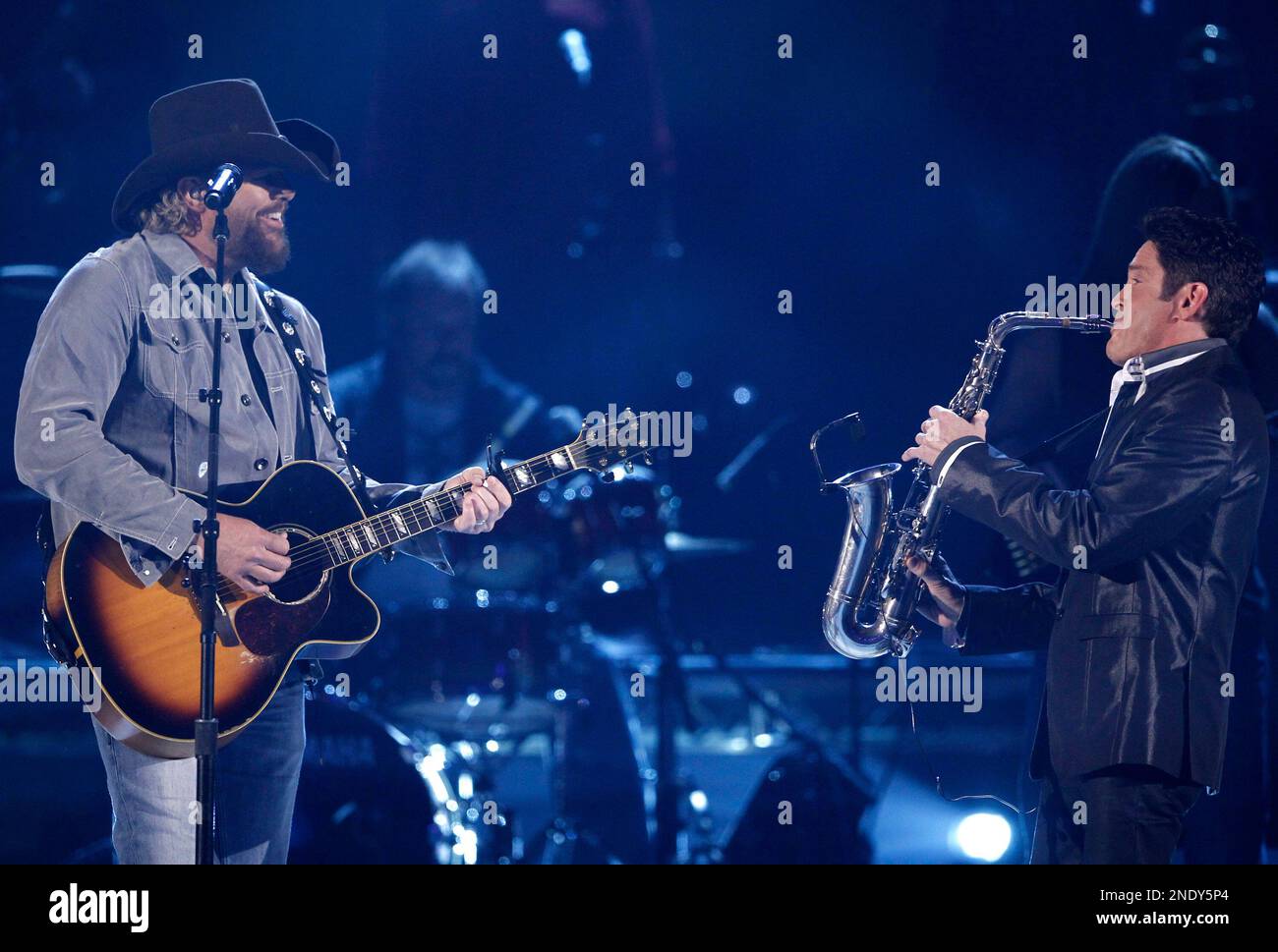 Toby Keith, left, and Dave Koz peform at the 45th Annual Academy of ...