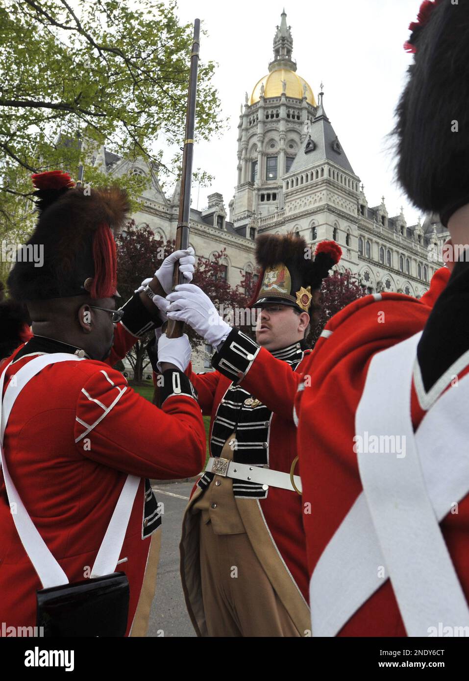 Sgt. Russell Scull, right, of the First Company Governor's Foot Guard ...