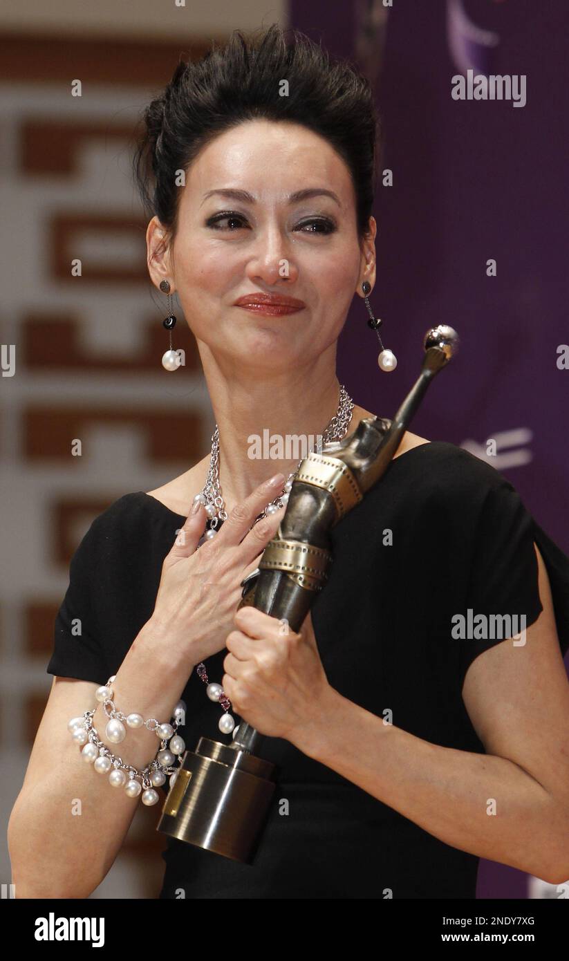 Hong Kong actress Wai Yin Hung celebrates after winning the best ...