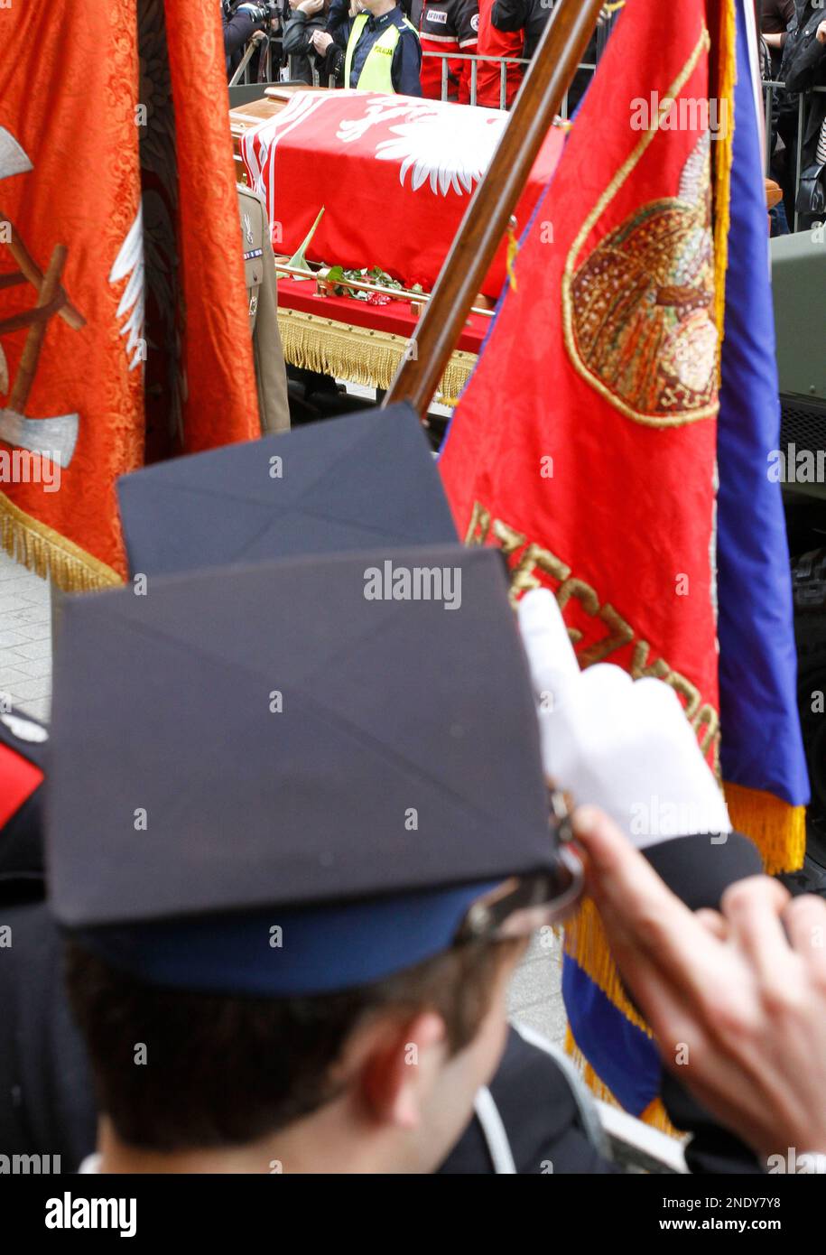People salute in front of the coffin of late Polish President Lech ...