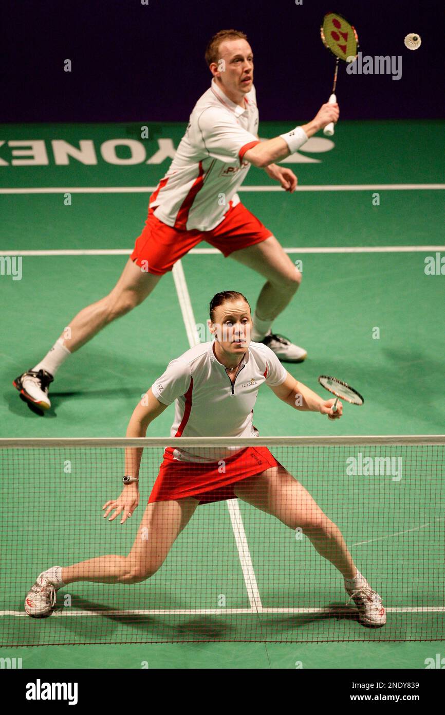Denmark's Kamilla Rytter Juhl, bottom stands ready as her teammate ...