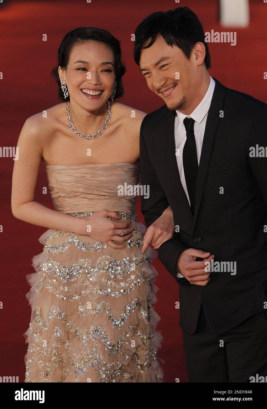 Taiwan actress Shu Qi, left and actor Chang Chen pose on the red carpet ...