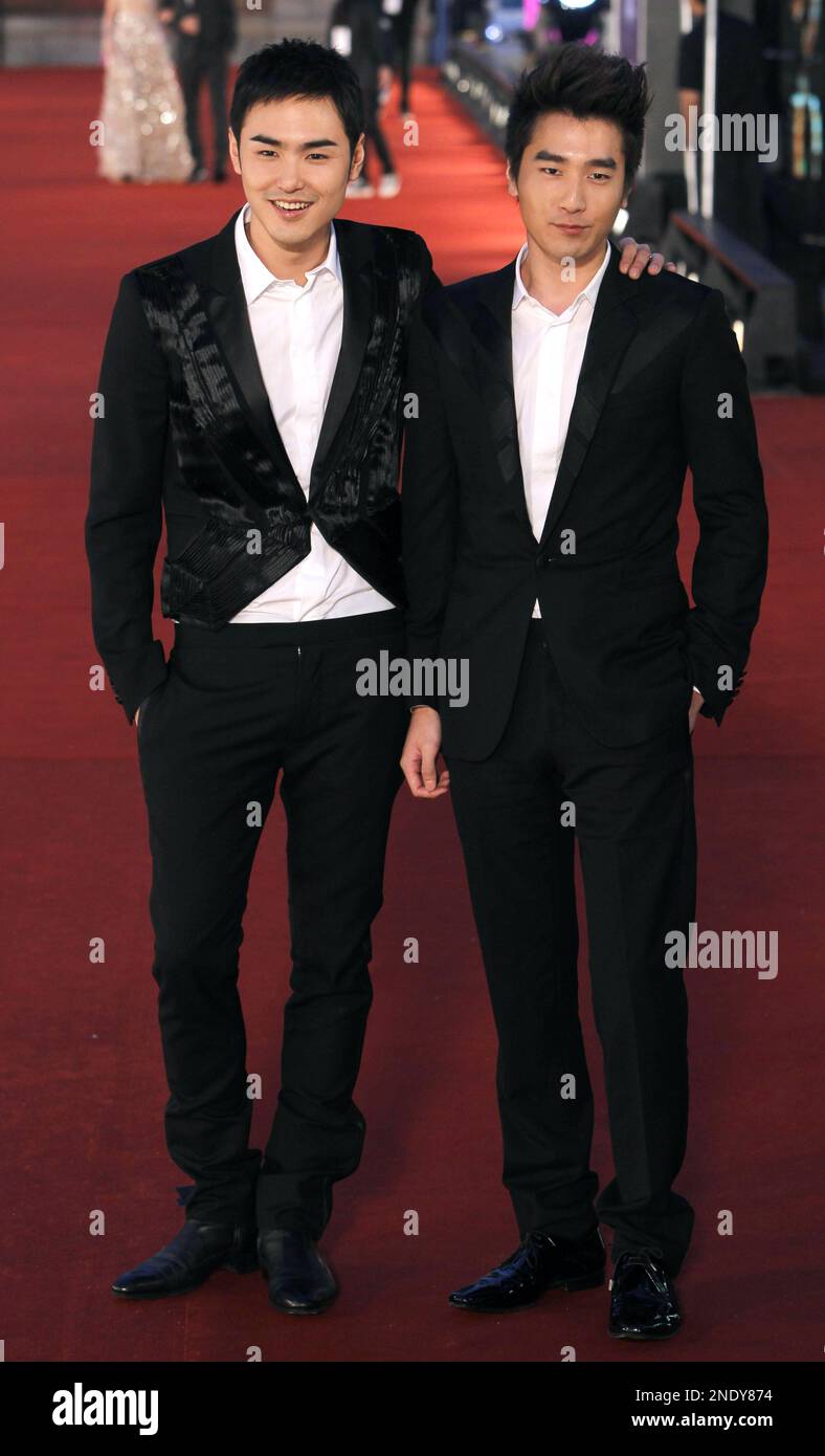 Taiwanese actors Ethan Ruan, left and Mark Chao pose on the red carpet ...