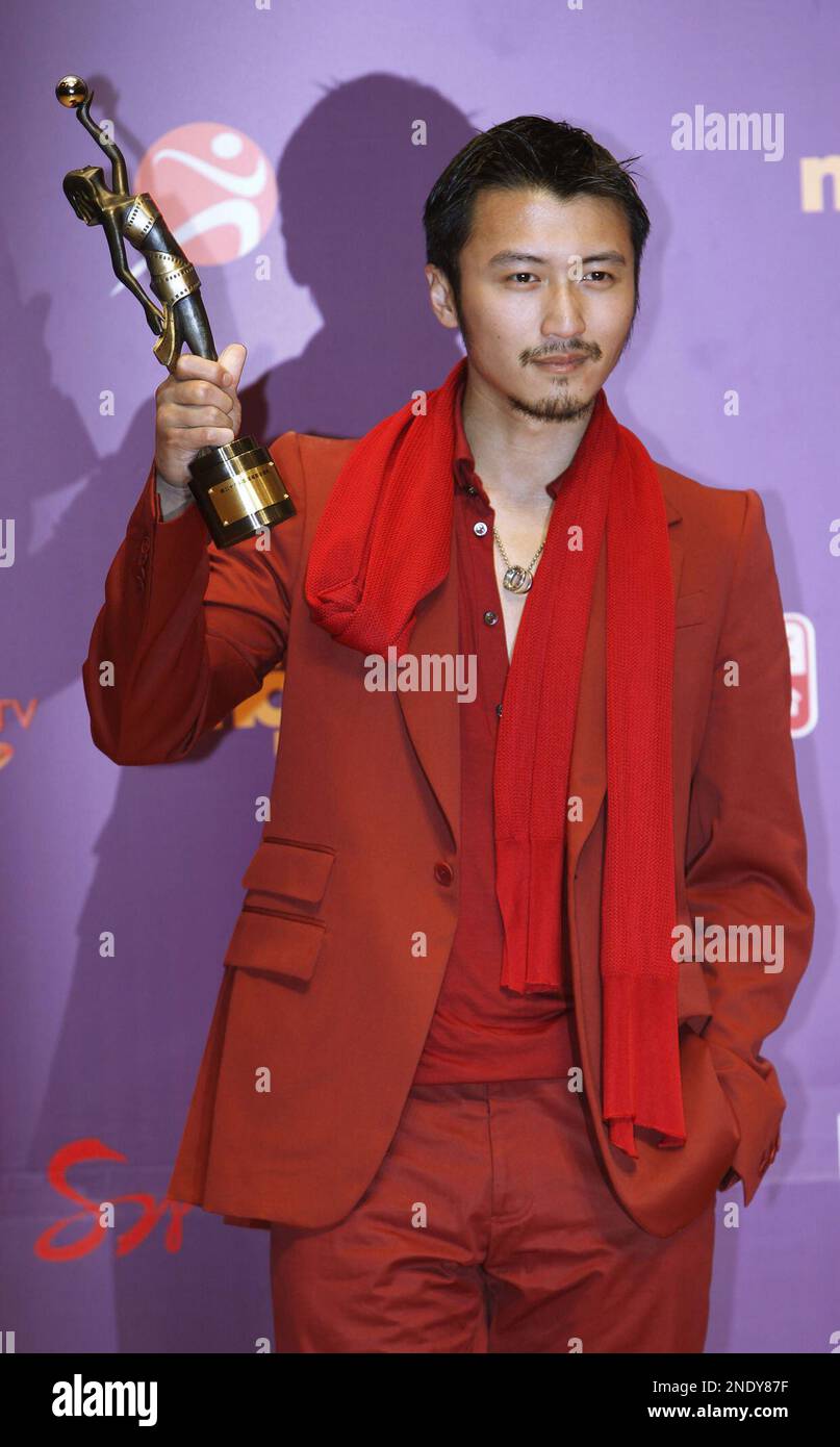 Hong Kong's actor Nicholas Tse celebrates after winning the best ...