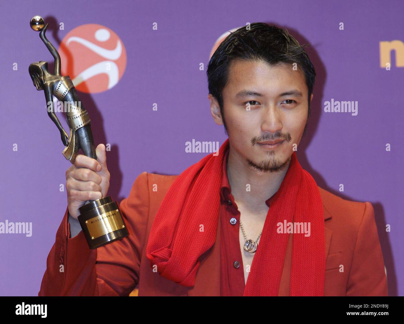 Hong Kong's actor Nicholas Tse celebrates after winning the best ...