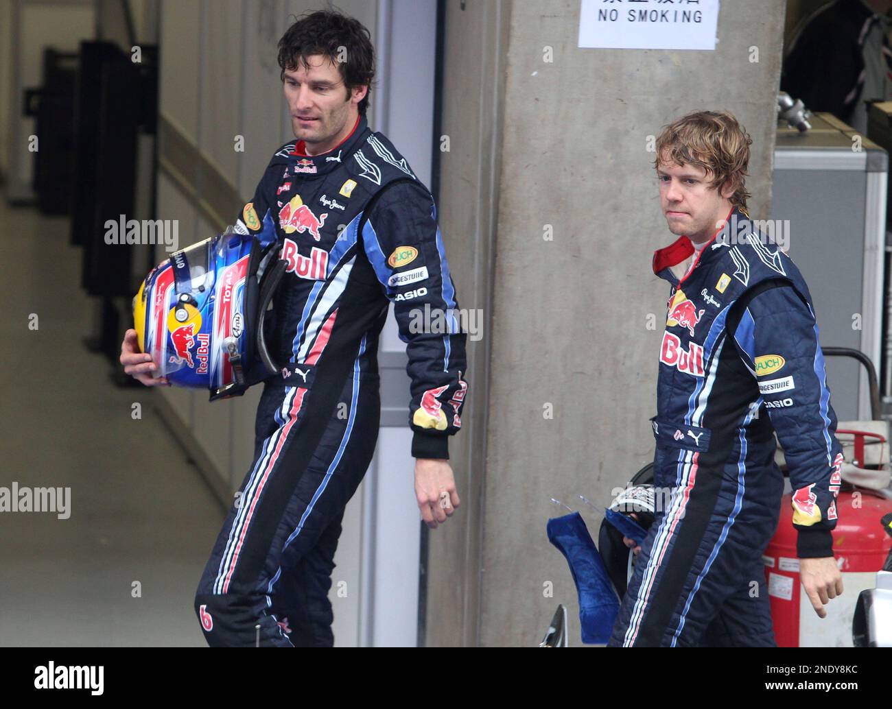 Red Bull teammates Mark Webber of Australia, left, and Sebastian Vettel ...