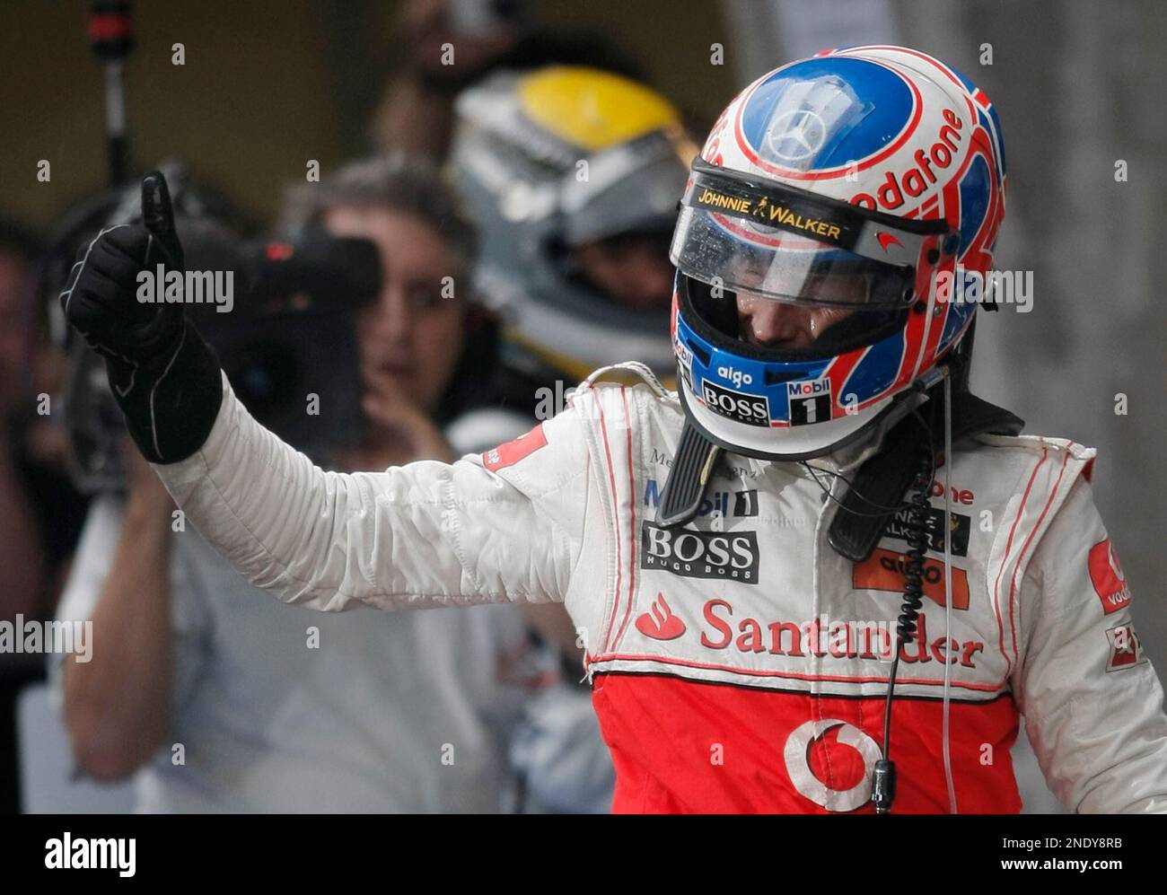 McLaren Formula One driver Jenson Button of Britain celebrates after ...