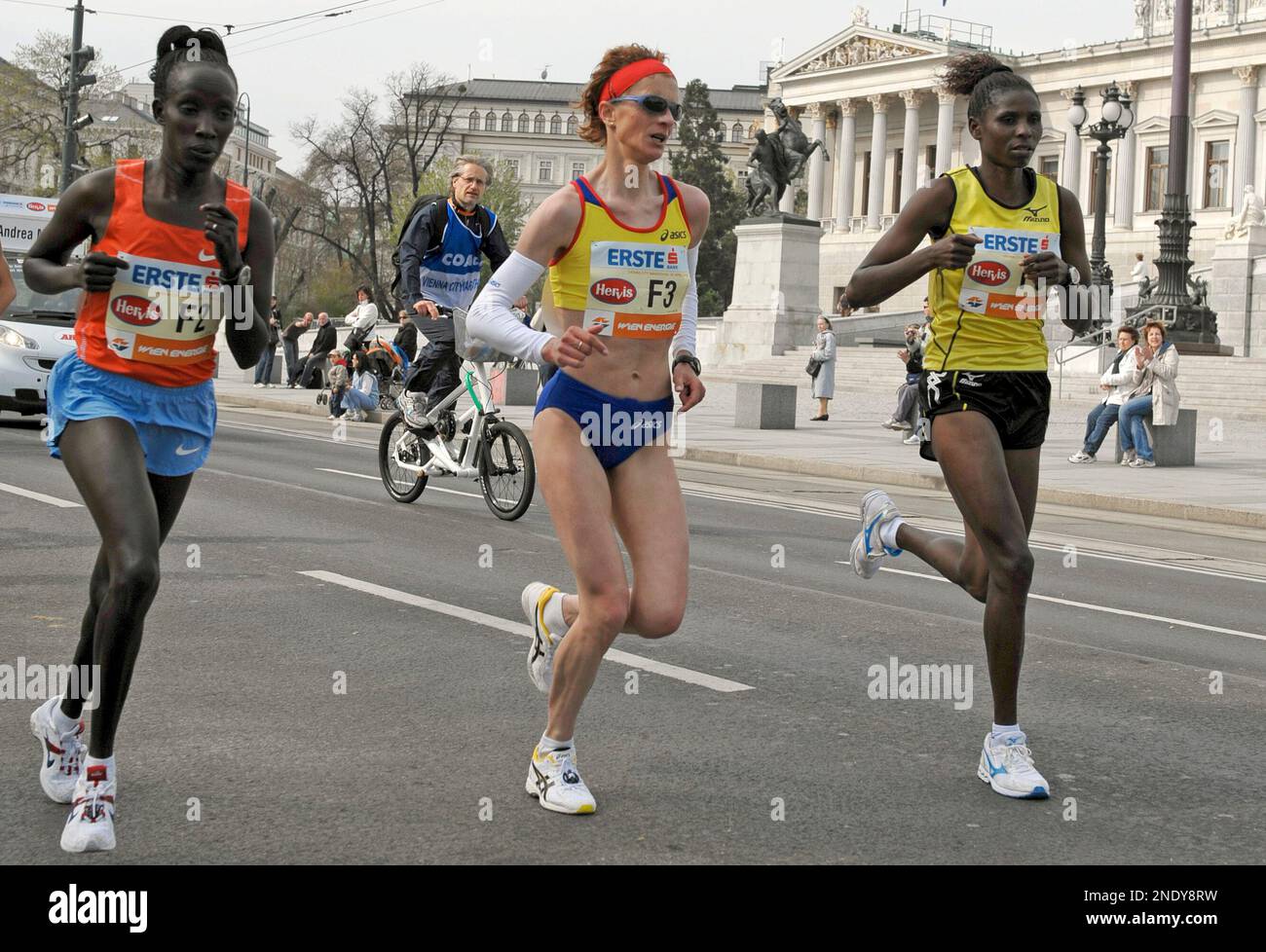 Winner of the women's race Hellen Kimutai of Kenya, left, Luminita ...