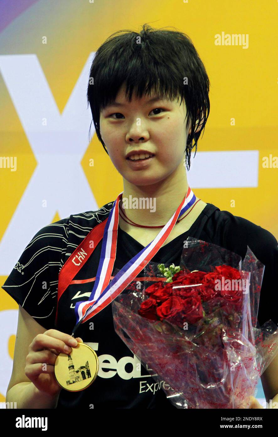 China's Xuerui Li poses with her gold medal at the medal's ceremony ...