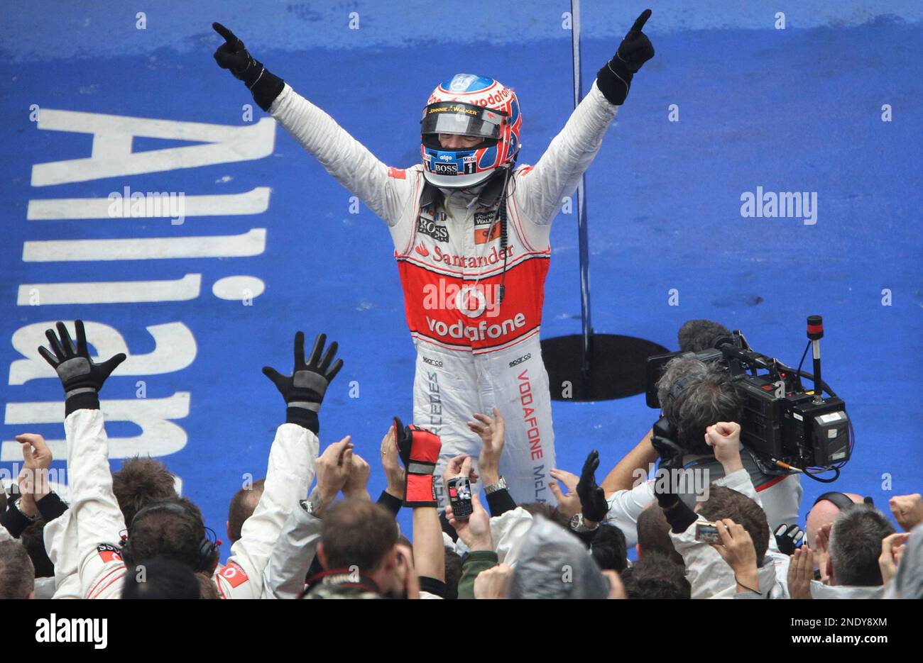 McLaren Formula One driver Jenson Button of Britain celebrates after ...