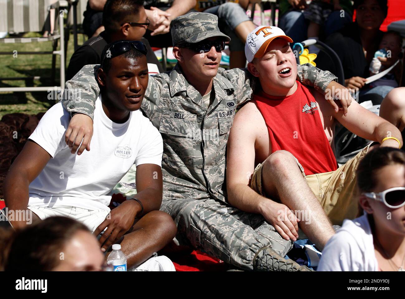 Airman 1st Class Lawrence Cooley, left, Airman Austin Bell, center, and ...